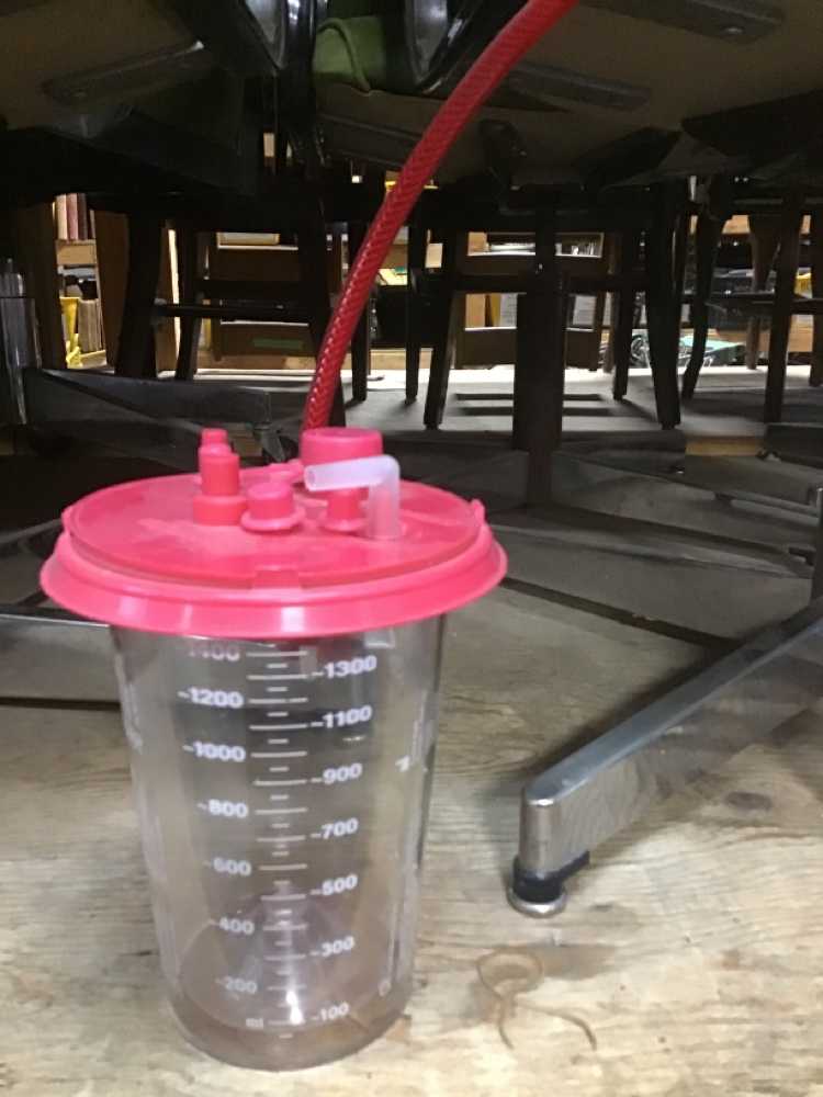 Clear/Red Plastic Medical Container